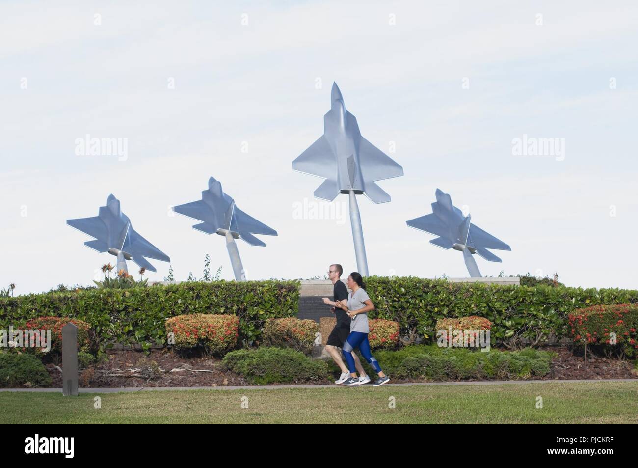 JOINT BASE PEARL HARBOR-HICKAM — Runners run past the Missing Man ...