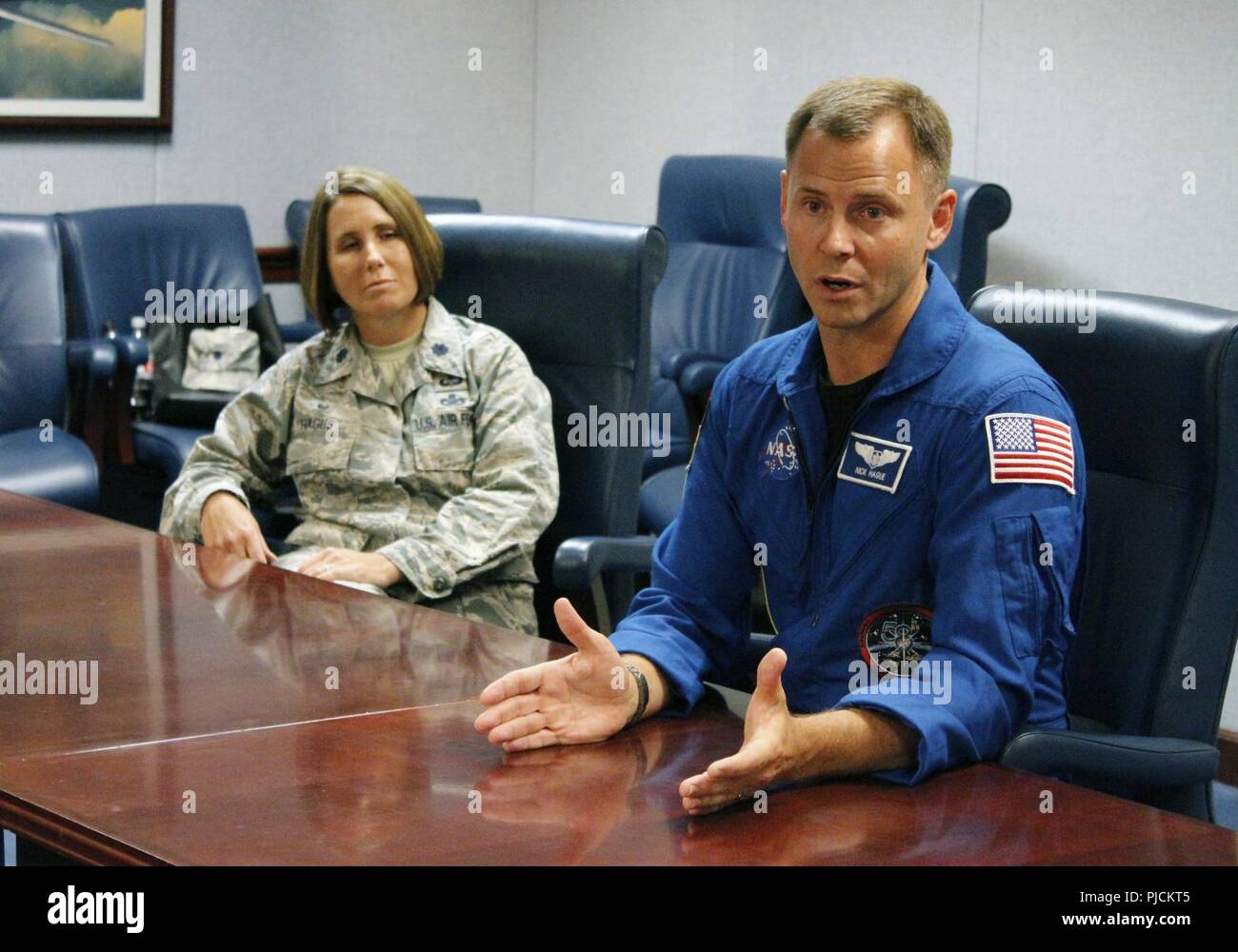 (From right to left) Col. Nick Hauge, an astronaut with NASA, and wife Lt. Col. Catie Hague ...