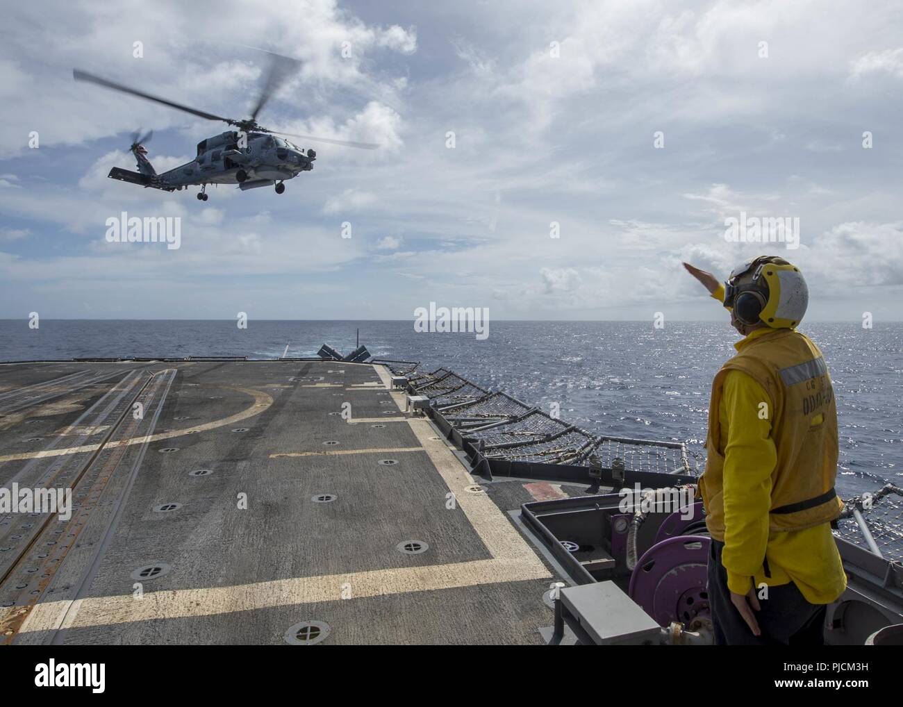 PACIFIC OCEAN (July 24, 2018) Boatswain’s Mate 2nd Class Nicholas Poole ...