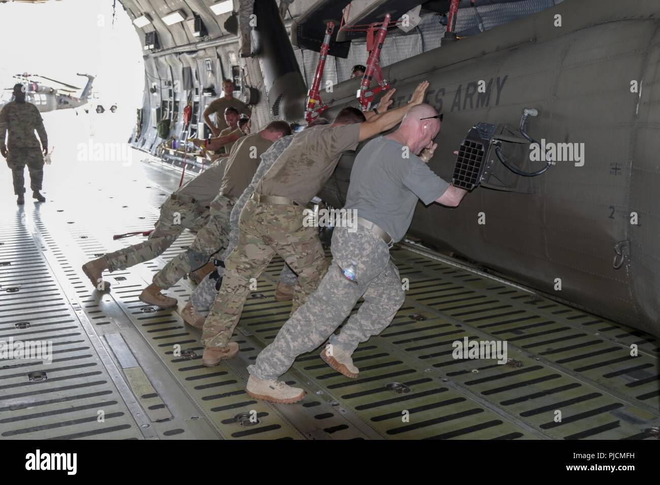 A Georgia Army National Guard helicopter maintenance and support crew ...