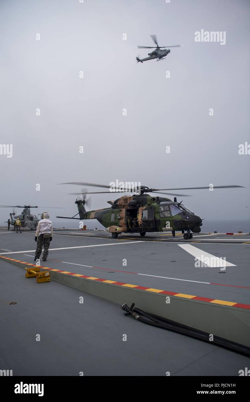 PACIFIC OCEAN (July 23, 2018) Royal Australian Navy landing helicopter ...