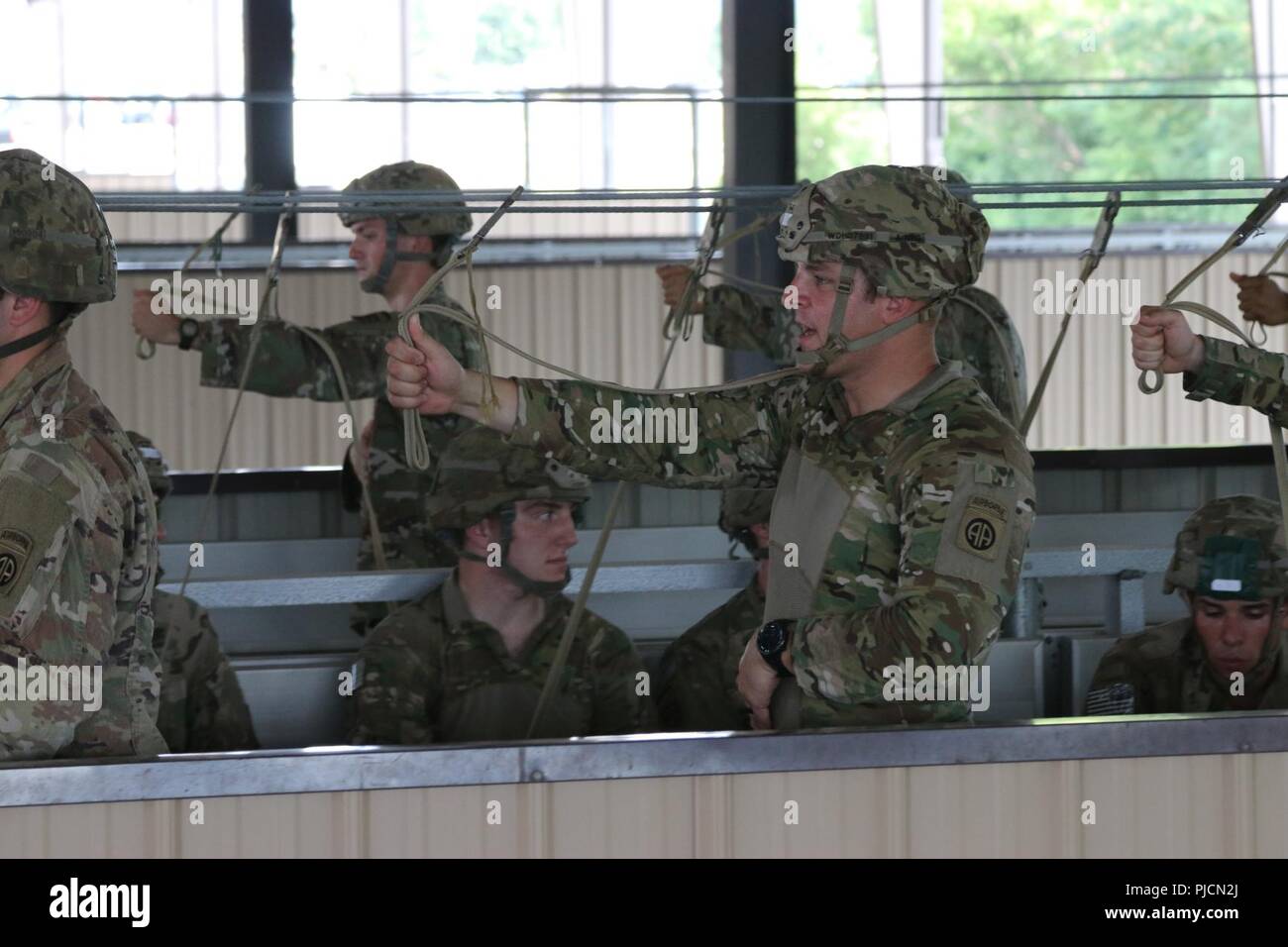 U.S. Army Pfc. Tyler Dunn (center, Front), a mortarman assigned to ...