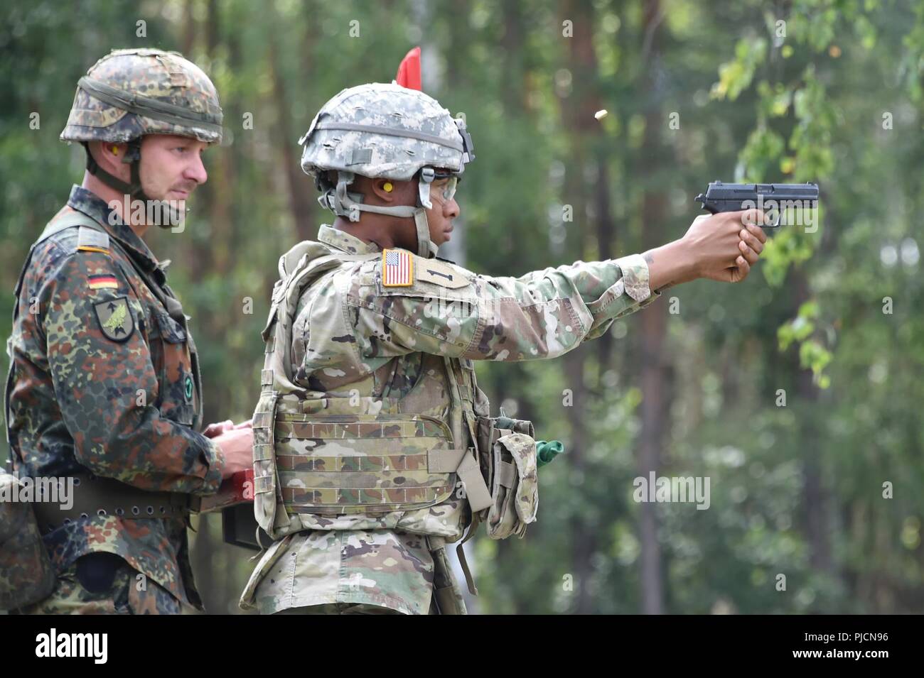 A U.S. Soldier, right, with the 18th Combat Sustainment Support ...