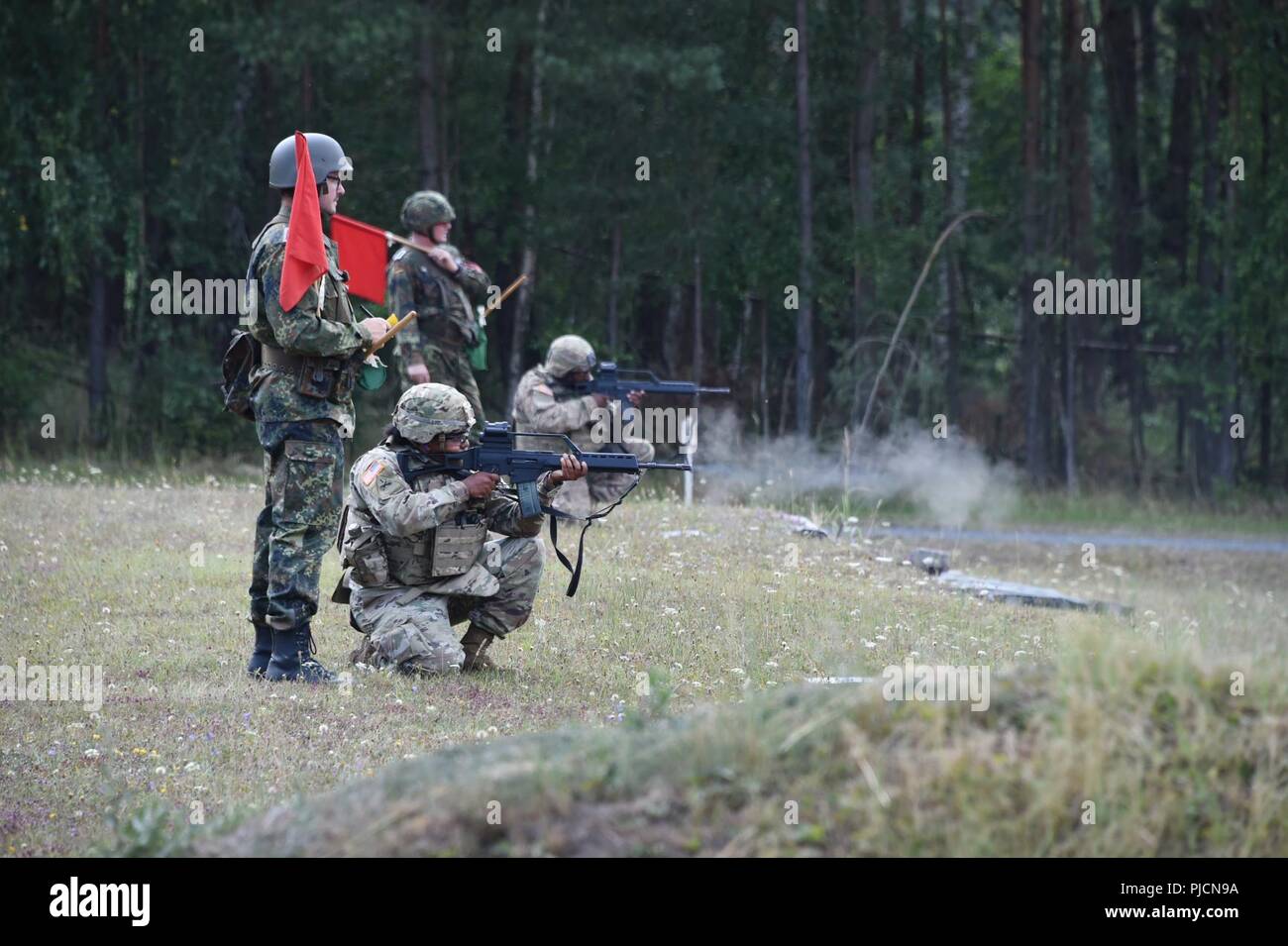 U.S. Soldiers, kneeling, with the 18th Combat Sustainment Support ...