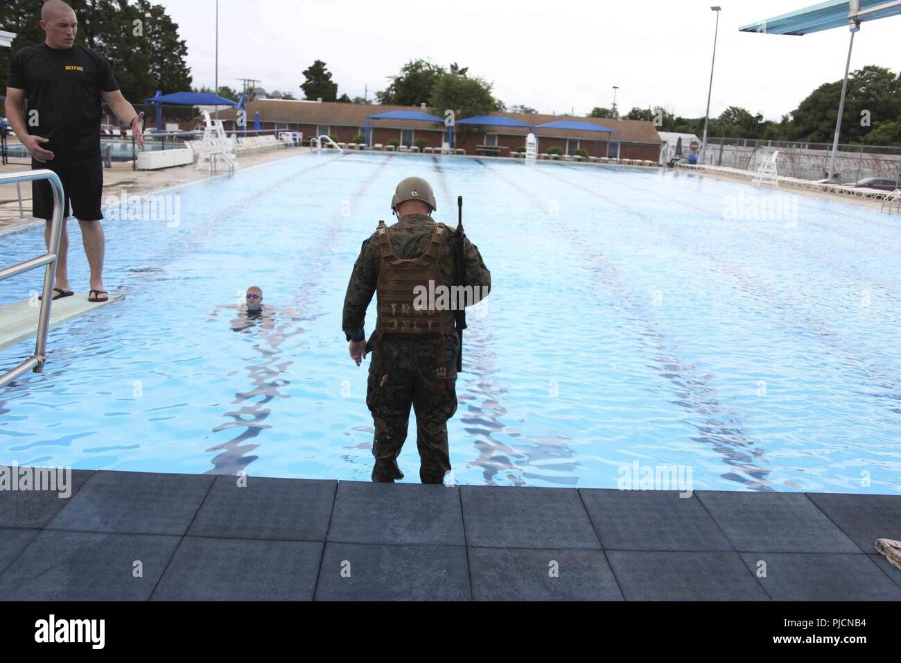 Commandant of the Marine Corps Gen. Robert B. Neller conducts a swim ...
