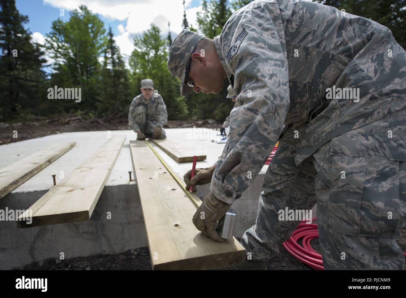 Senior Airman Eric Stanton and Airman 1st Class Jonah Aadland, both ...