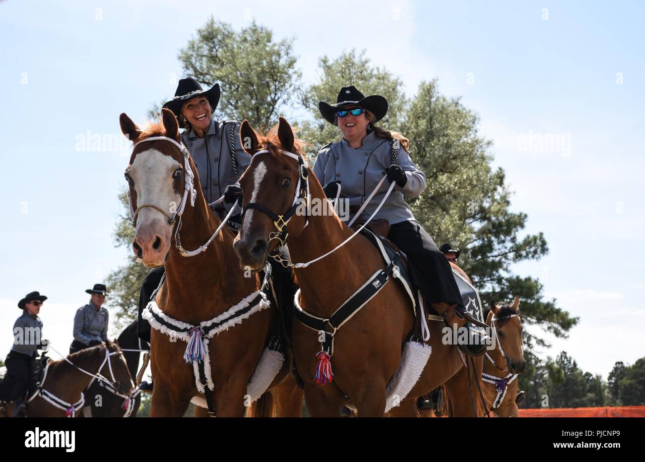 Members of the Trotters turn a corner in a column as they demonstrate ...