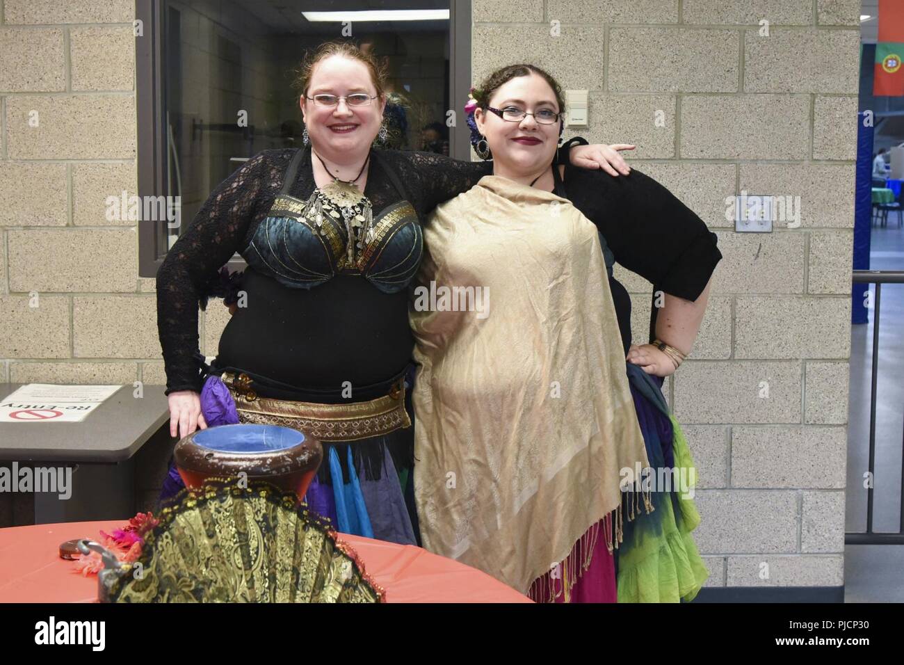 (Left) Kelly Ferguson and Amanda Burk, belly dancing instructors, pose ...