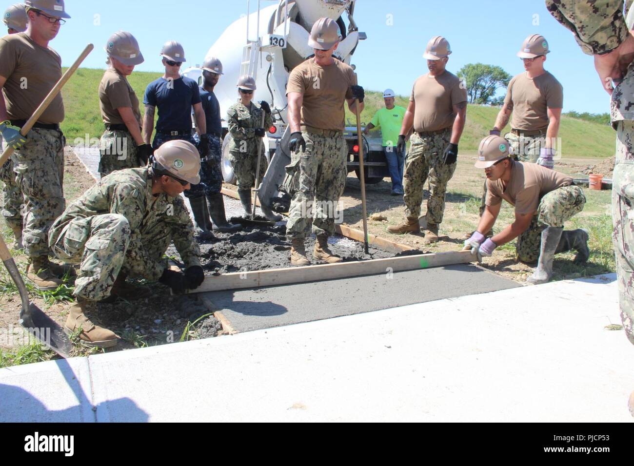 NMCB 27 Seabees conduct training with a concrete pour in range three at ...