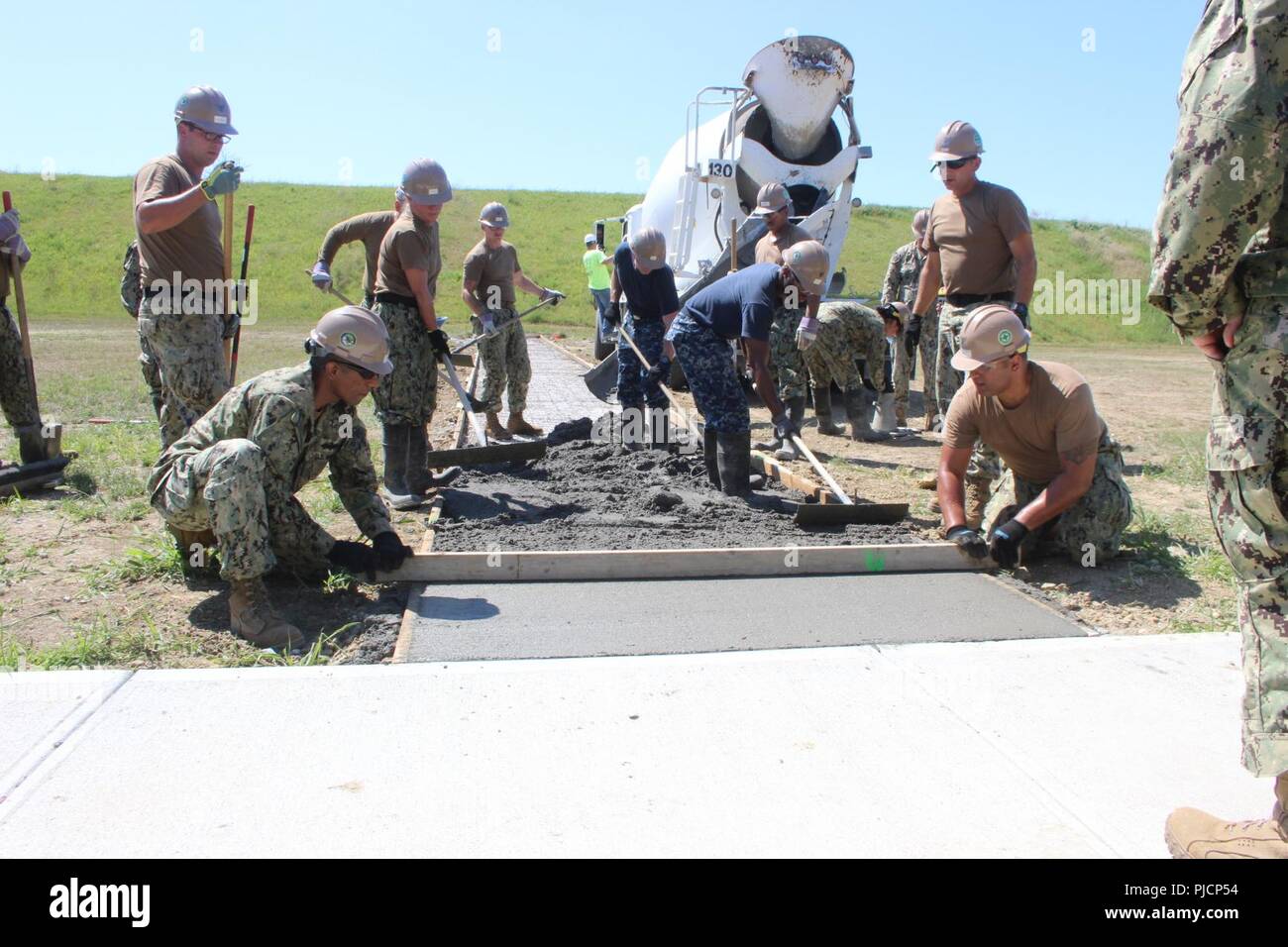 NMCB 27 Seabees conduct training with a concrete pour in range three at ...