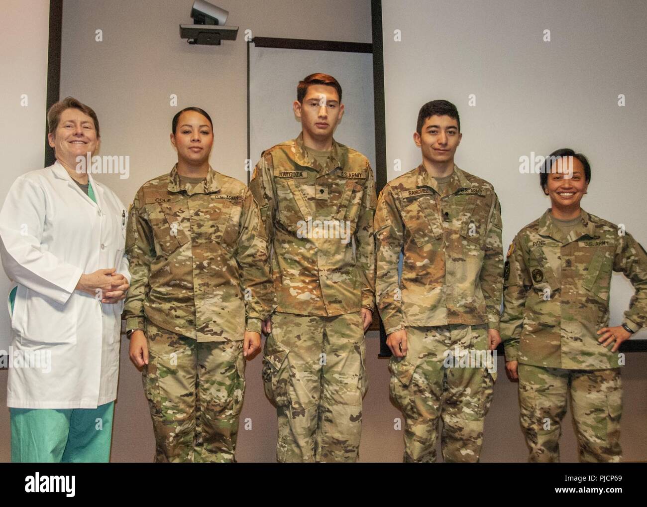 Col. Shawna Scully (left), deputy commander for medical services ...