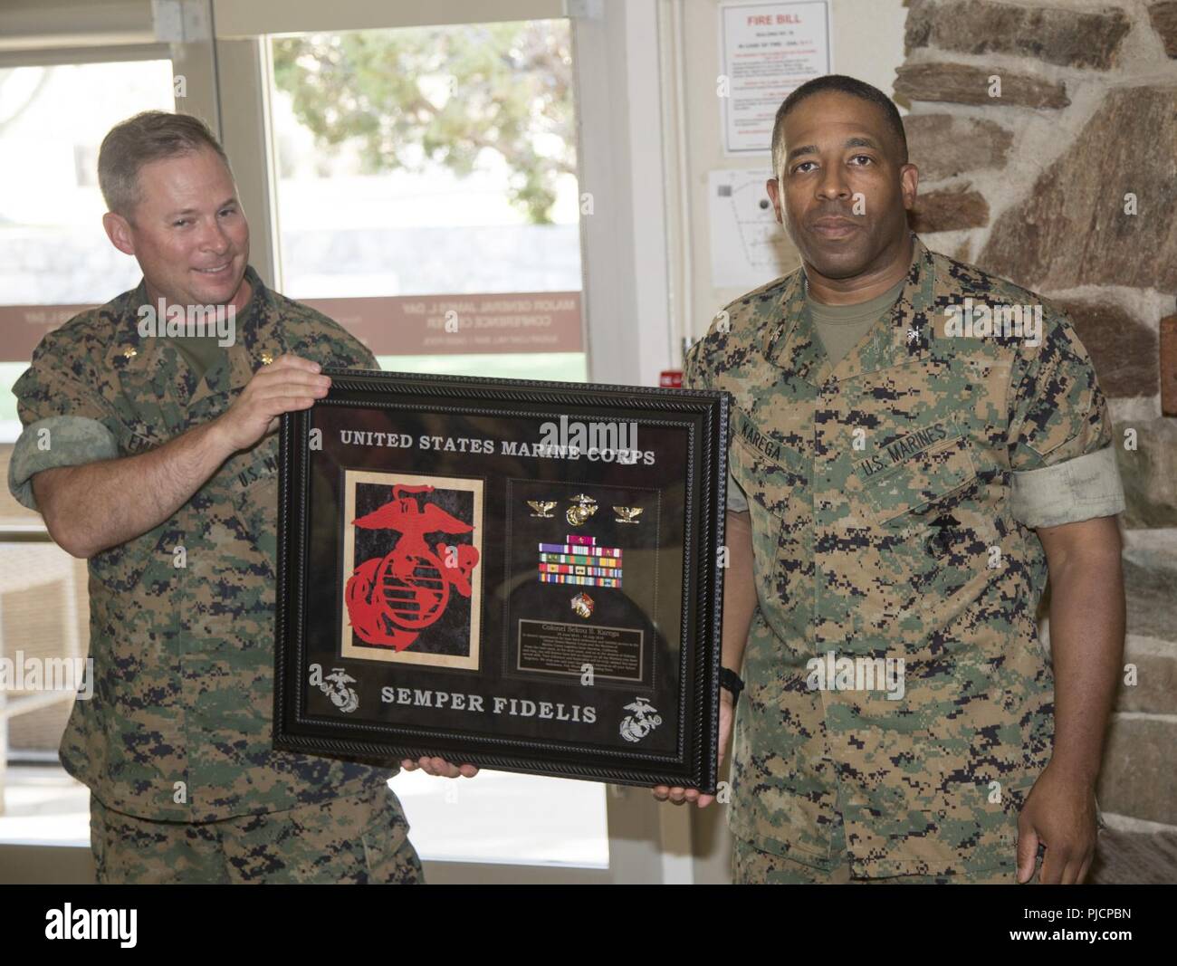 Major Derek Emery, base adjutant, presents outgoing MCLB Barstow ...