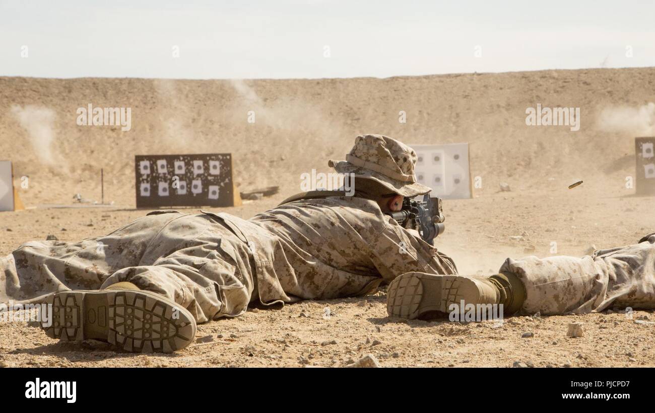 U.S. Marines and Sailors with 3rd Battalion, 6th Marine Regiment fire ...