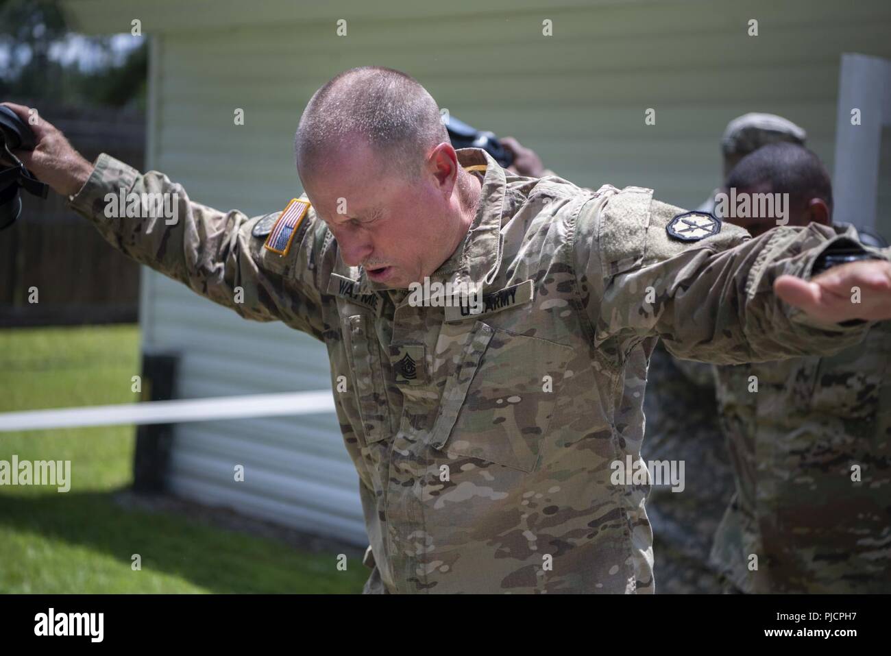Command Sgt Maj. Fred Waymire from the 317th Military Police Battalion ...