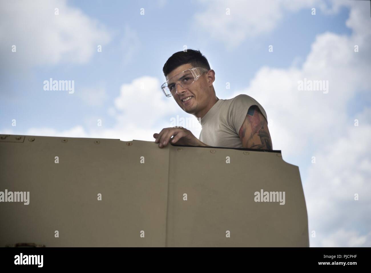 Spc. Anthony Negron, a U.S. Army Reserve wheeled vehicle mechanic from ...