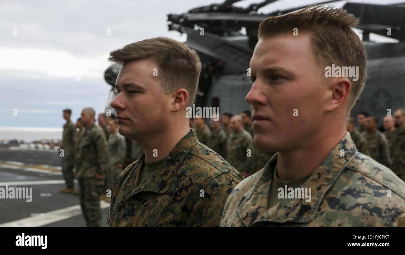 PACIFIC OCEAN - U.S. Marine Cpl. Andrew Shannon (right), an assault man ...