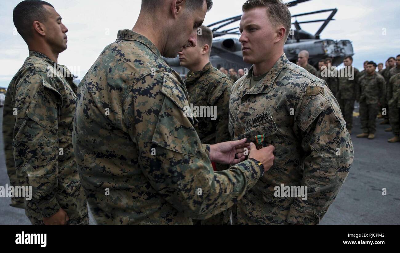 PACIFIC OCEAN - U.S. Marine Cpl. Andrew Shannon, an assault man with ...
