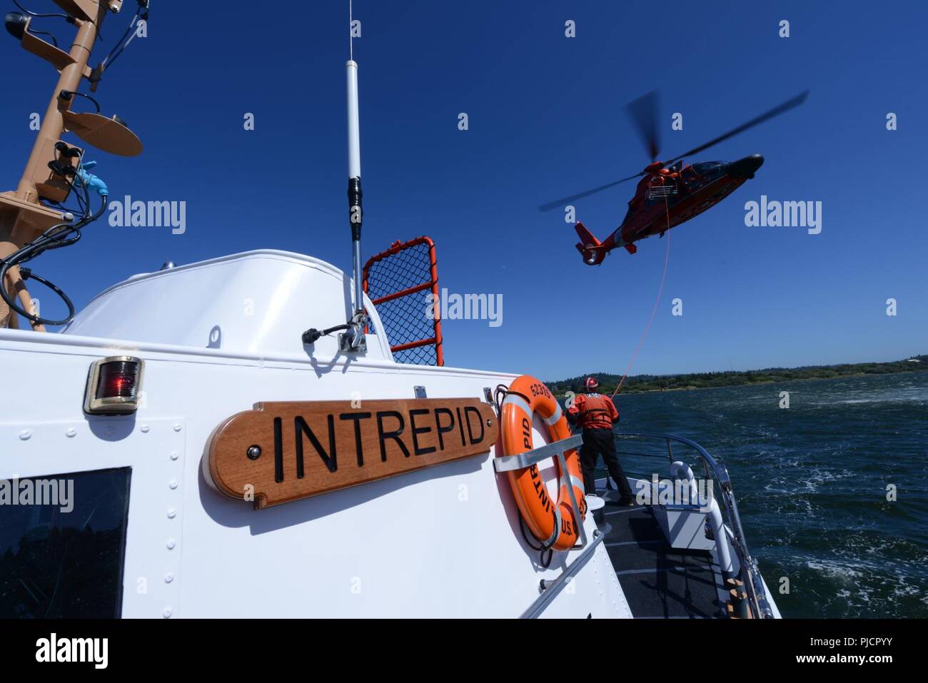 Crewmembers aboard the 52-foot Motor Life Boat Intrepid from Coast ...