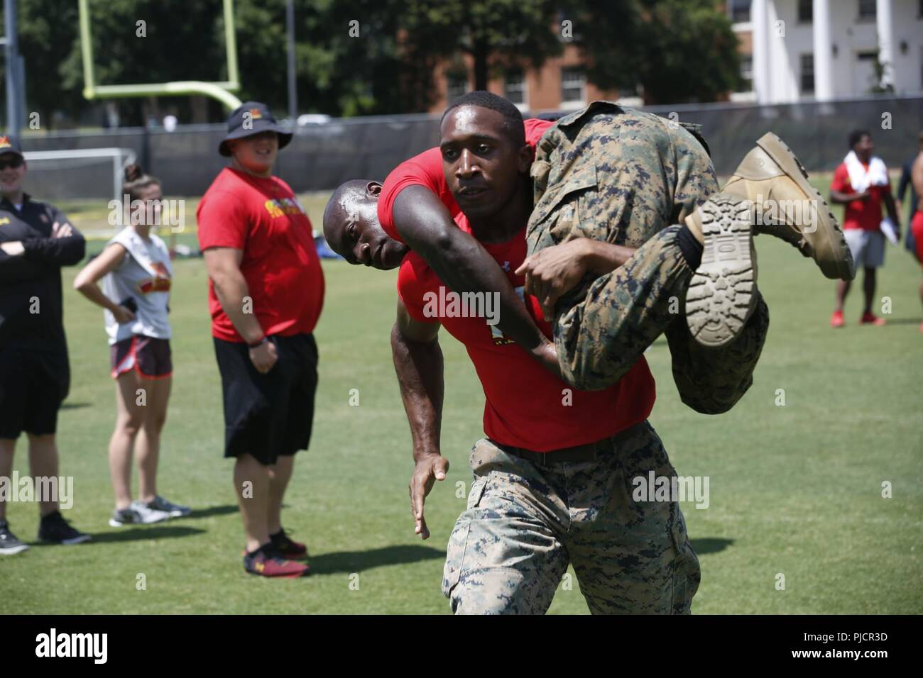 Firemans carry hi-res stock photography and images - Alamy