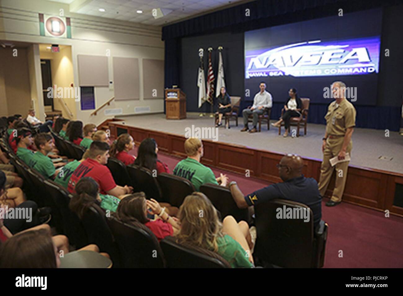 Capt. Michael Coughlin (right), Naval Undersea Warfare Center Division Newport Commanding ...
