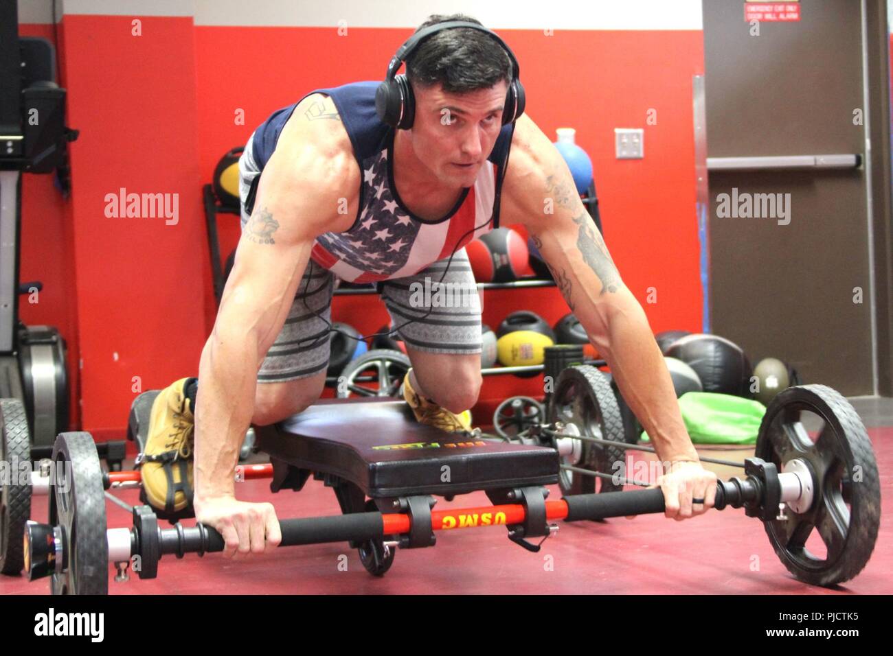 A handful of Marines participate in a weightlifting competition held at ...