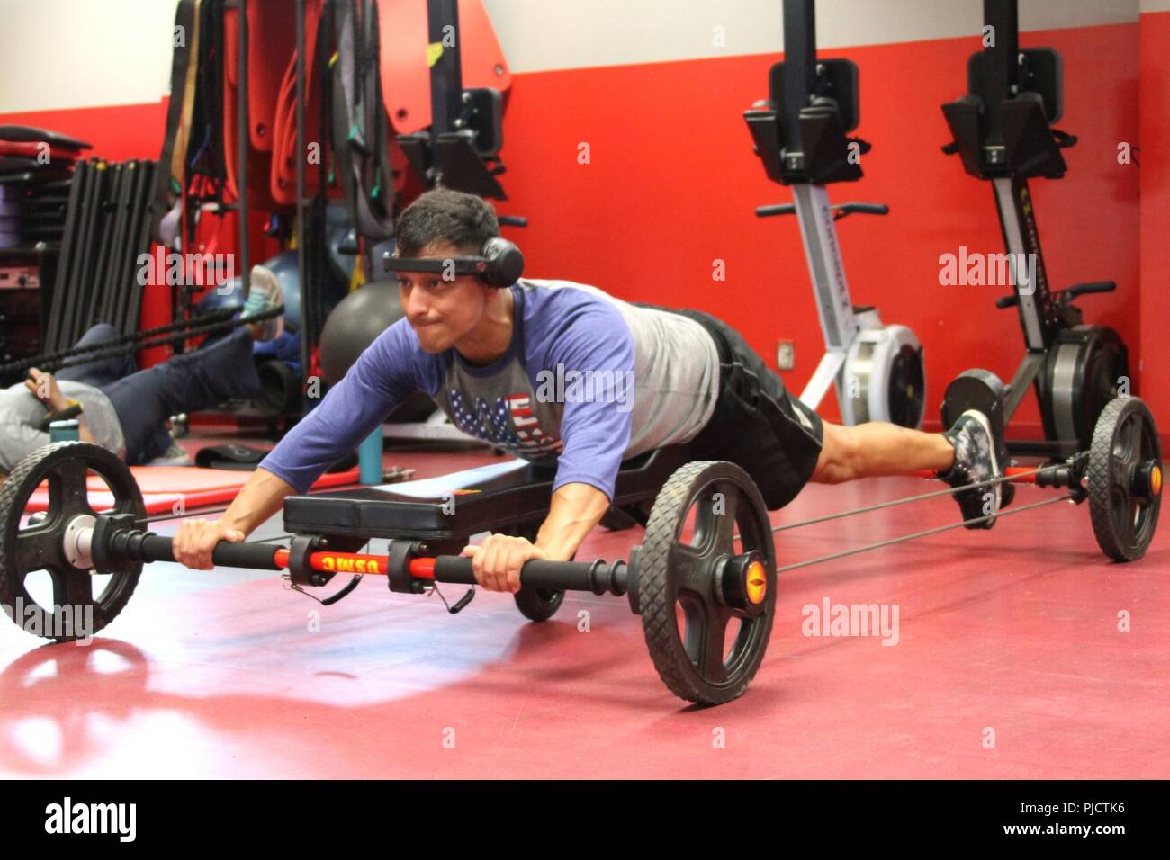 A handful of Marines participate in a weightlifting competition held at ...
