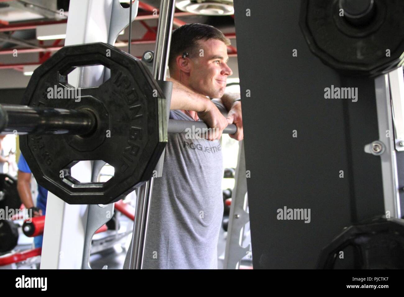 A handful of Marines participate in a weightlifting competition held at ...