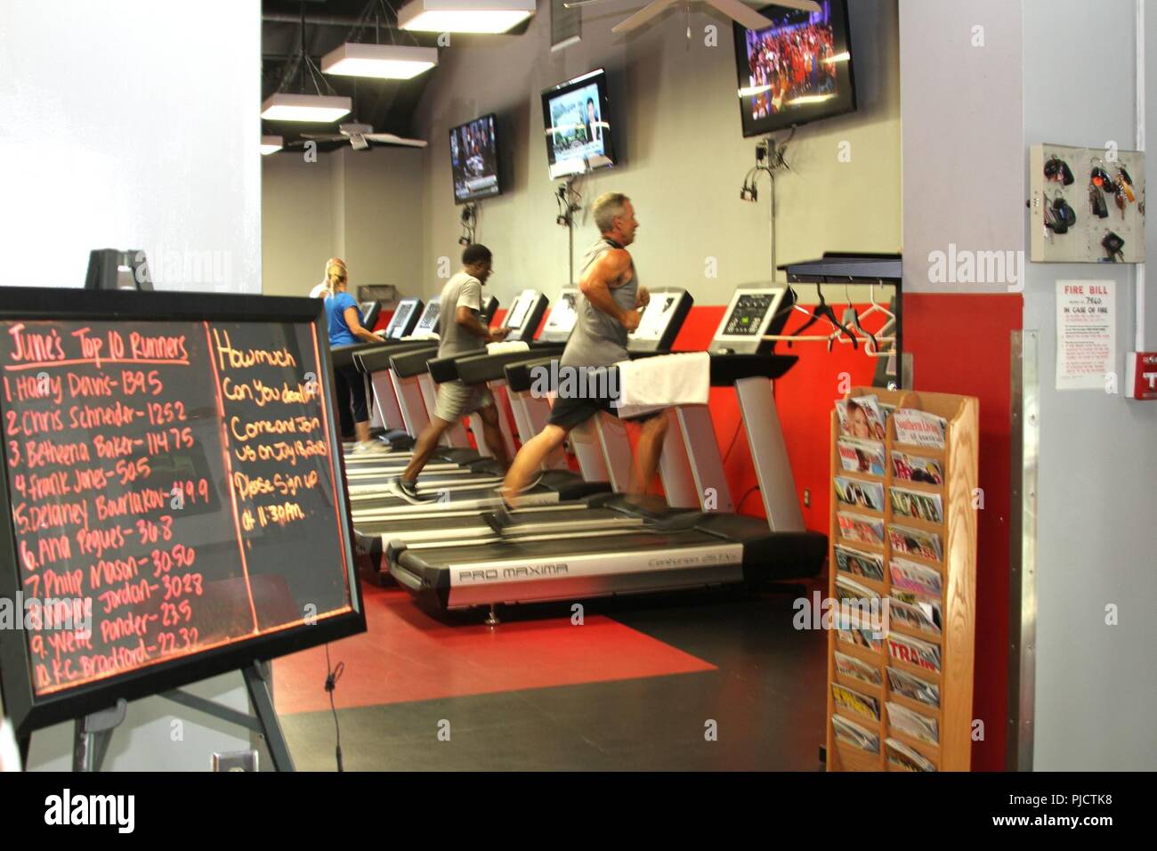 A handful of Marines participate in a weightlifting competition held at ...