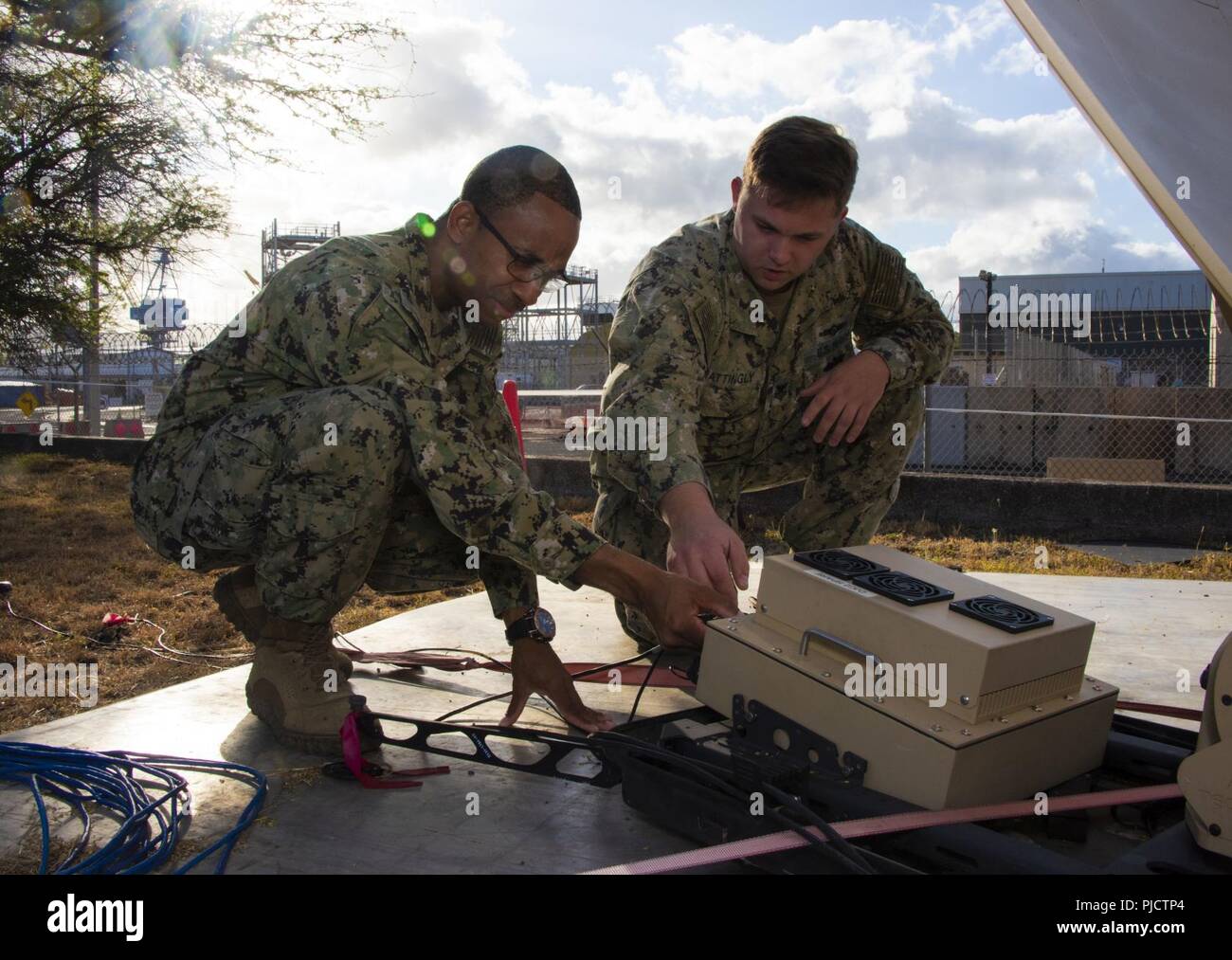 PEARL HARBOR (July 6, 2018) Sailors work at the U.S. 3rd Fleet ...