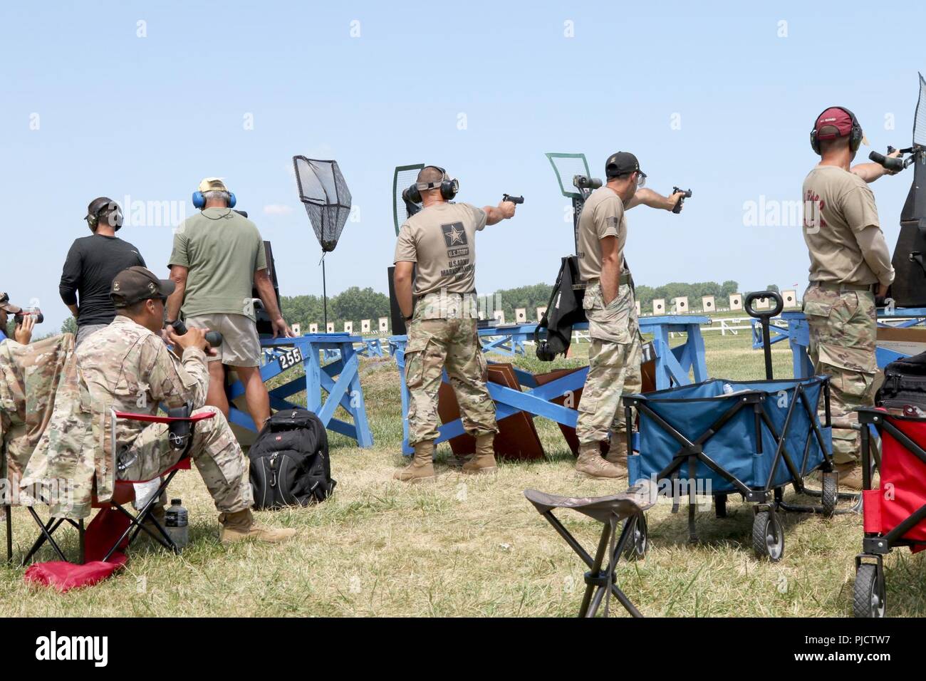 Sgt. Christopher Hudock watches Staff Sgt. Greg Markowski and Sgt ...