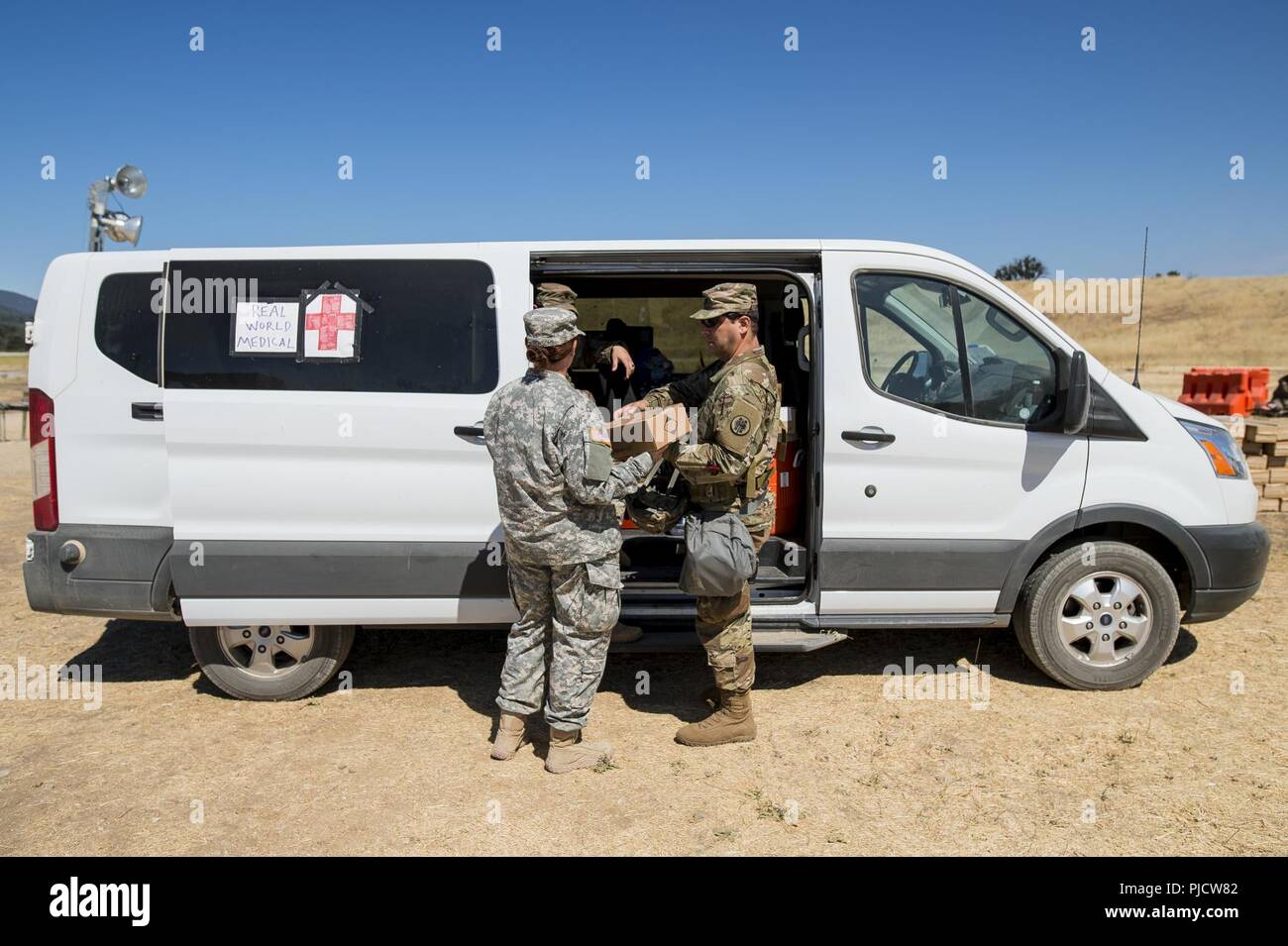 Lt. Col. Louis DiBernardo (right), a U.S. Army Reserve brigade surgeon ...