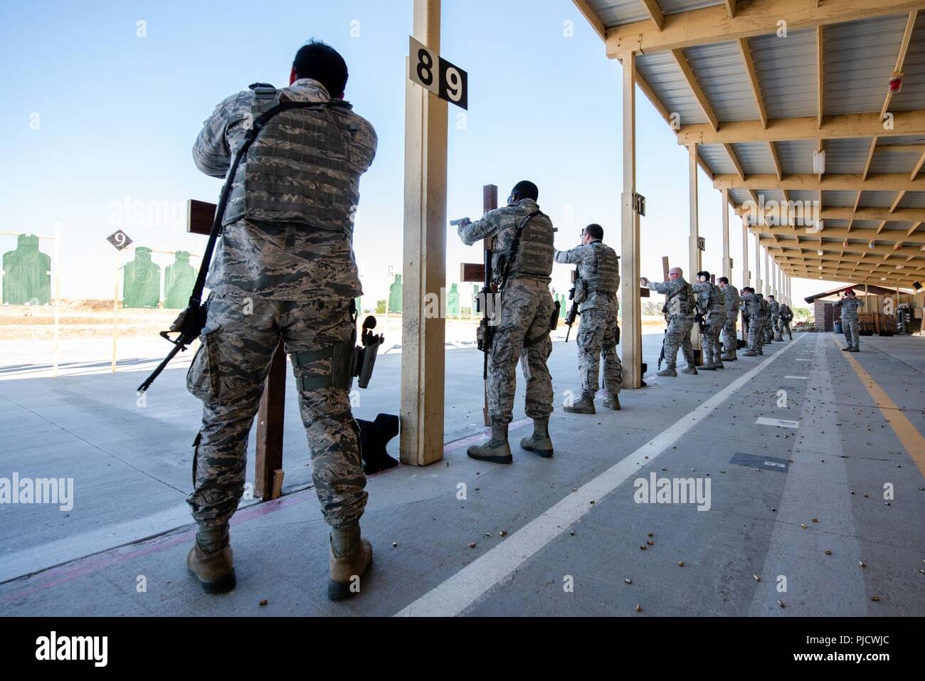 Combat Arms Training and Maintenance (CATM) students fire their weapons ...