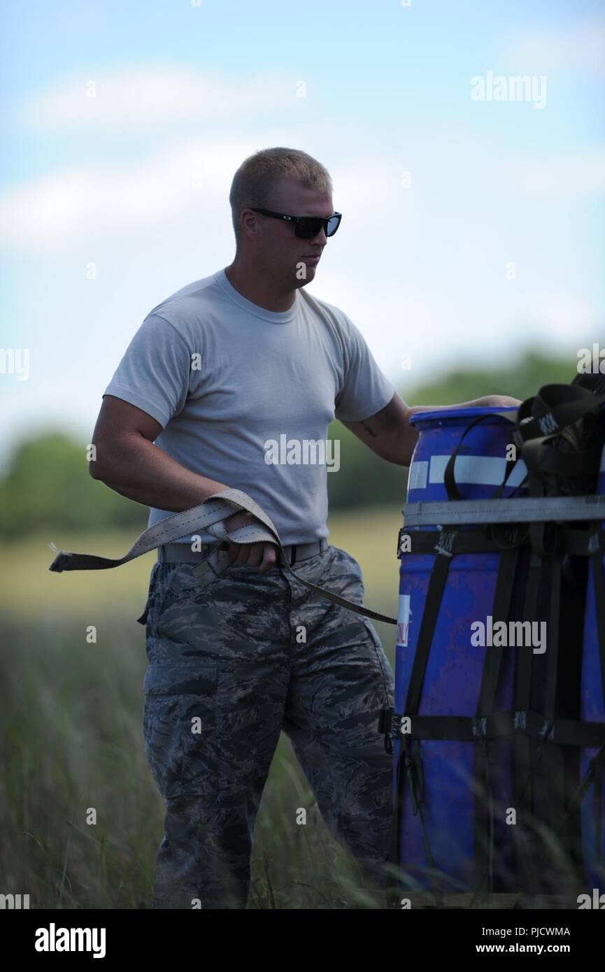 27th Aerial Port Squadron Staff Sgt. David Hambly and Senior Airman ...