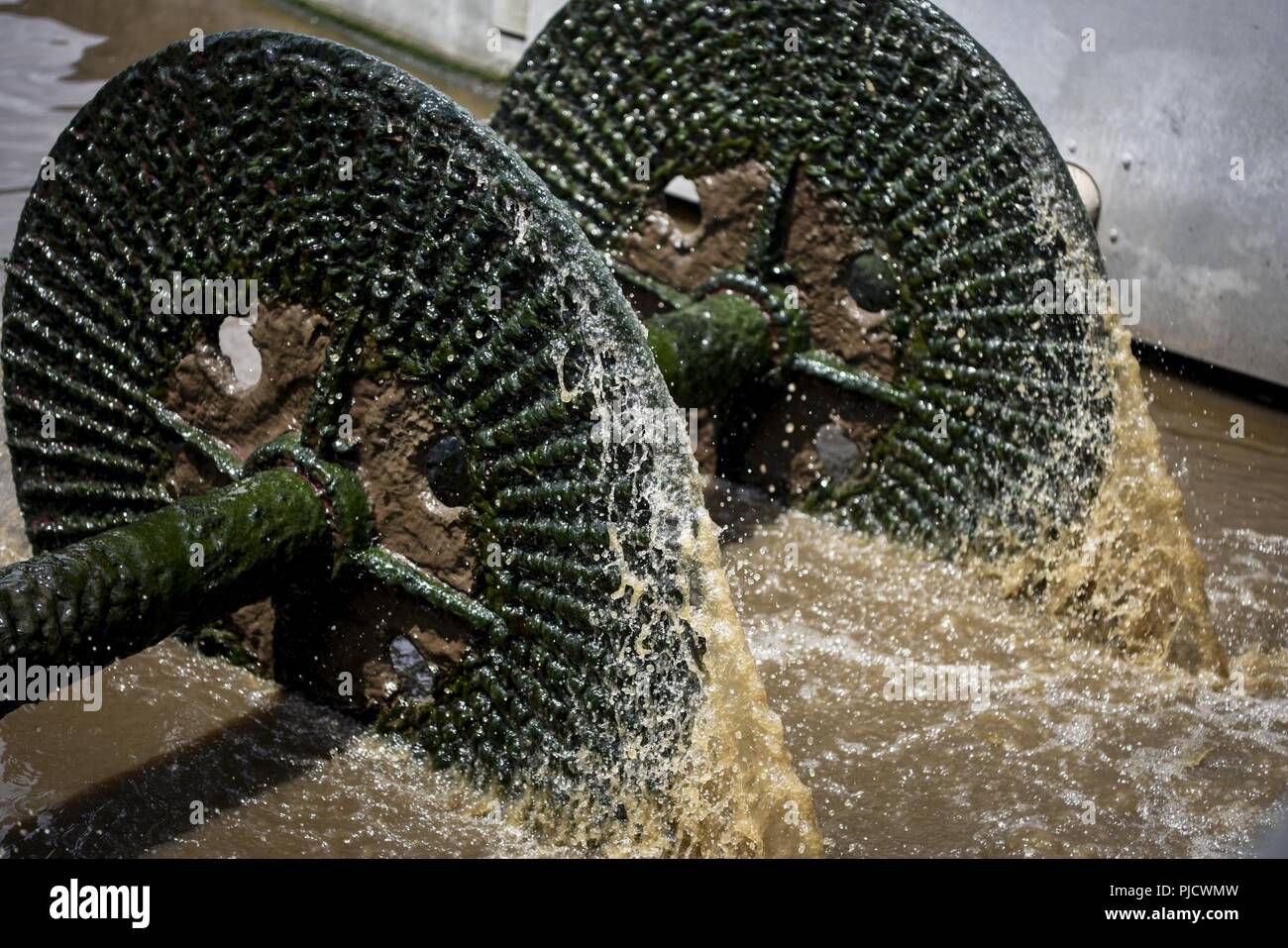 A rotor aerates water during the treatment process at the Hurlburt ...