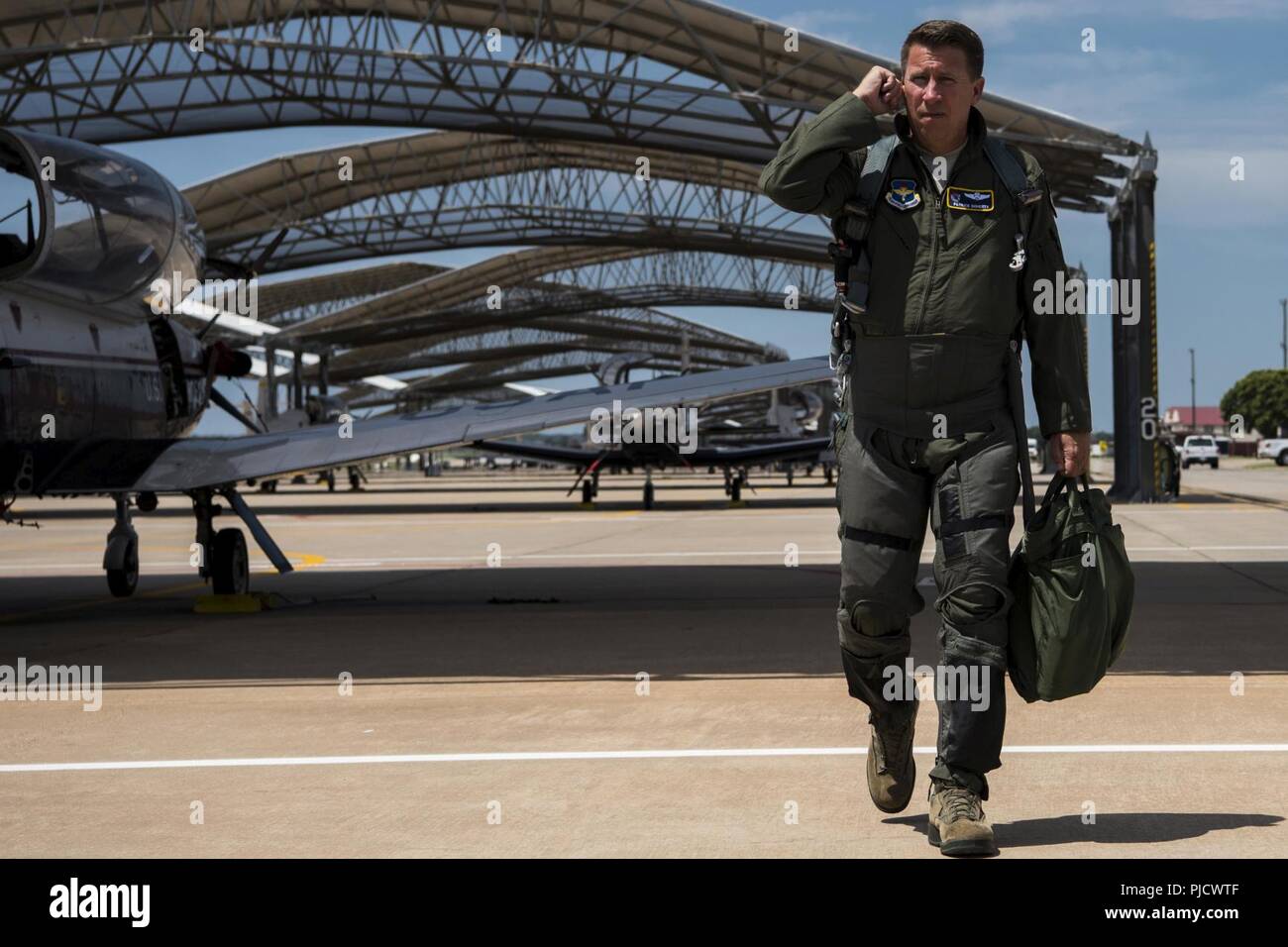 Major General Patrick Doherty, Commander, 19th Air Force, walks to a T ...