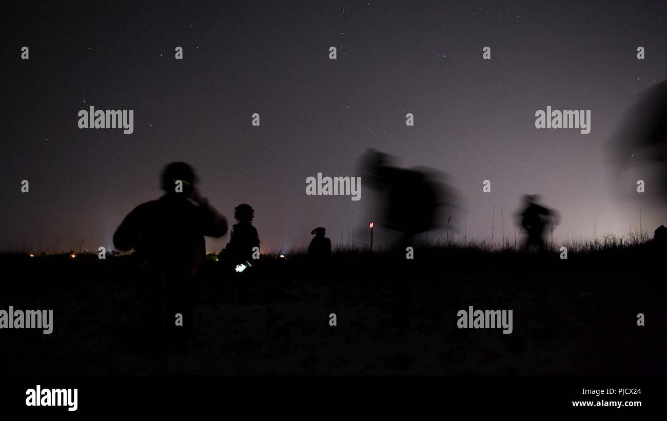 U.S. Navy Sea, Air, and Land Team Members conduct military field ...
