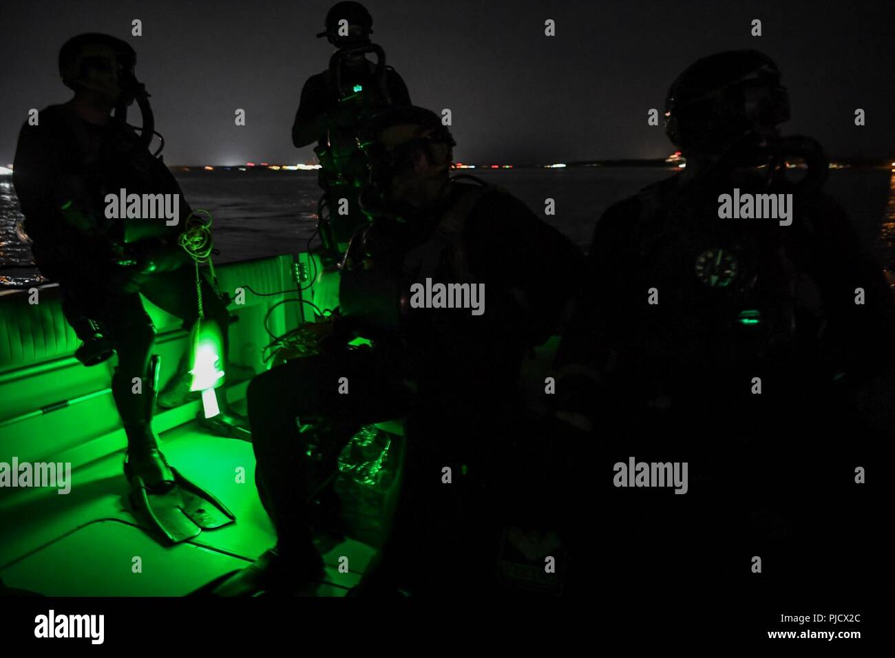 U.S. Navy Sea, Air, and Land Team Members conduct military dive ...