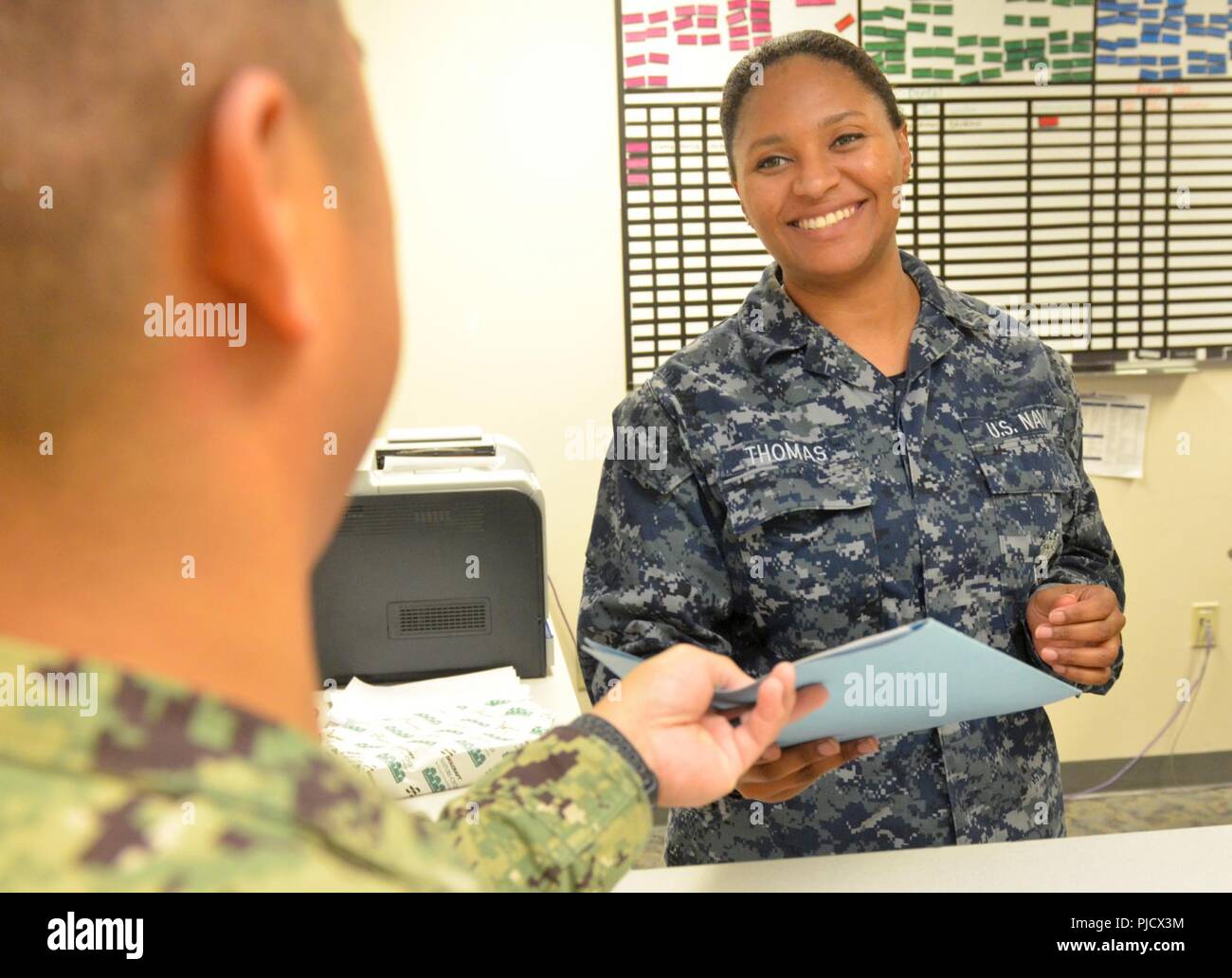 JACKSONVILLE, Fla. (July 24, 2018) Hospitalman Antoine Thomas accepts a ...