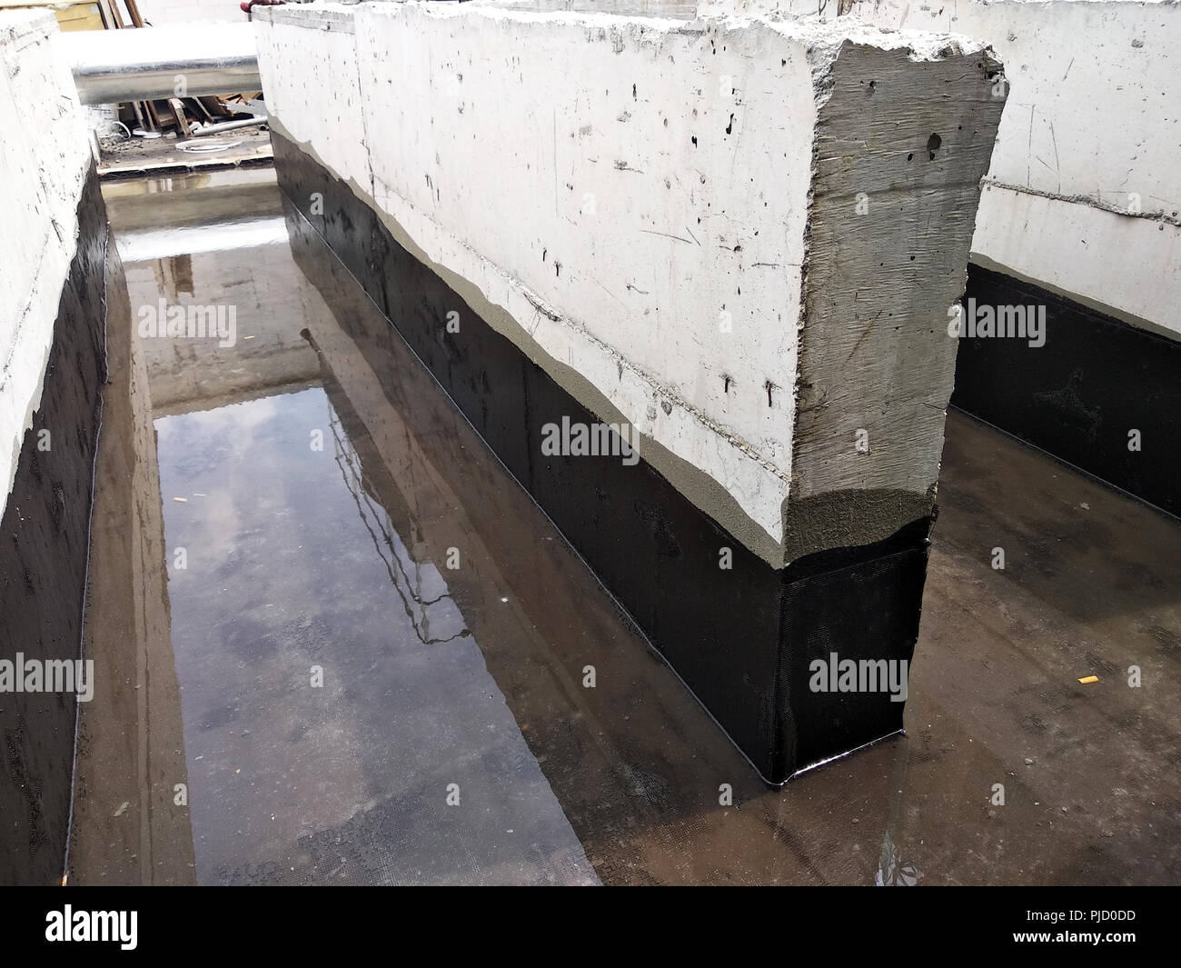 Ponding test conducted after applying waterproofing layer to the ...