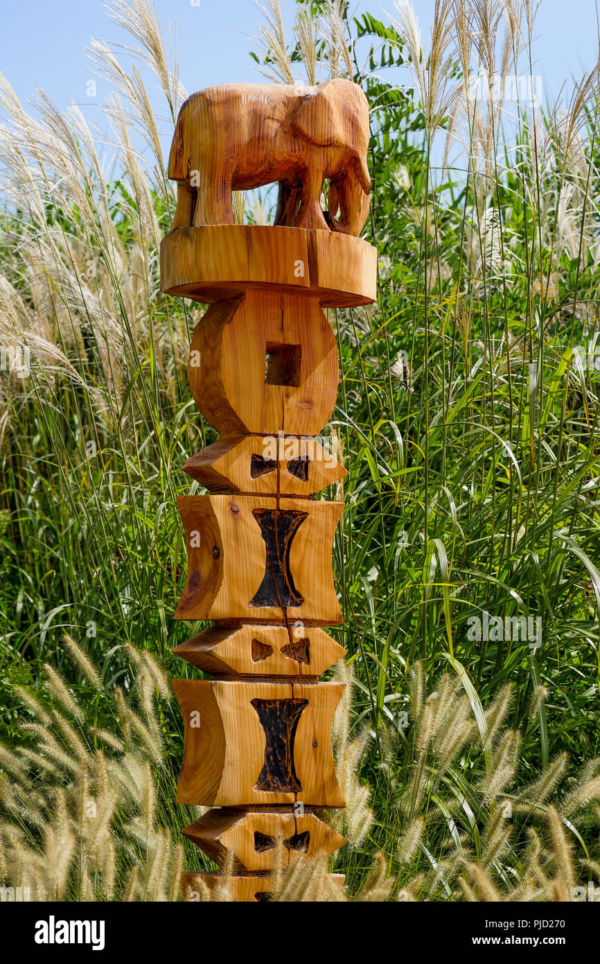 Wood made totems, Birds Park, Villars Les Dombes, France Stock Photo ...