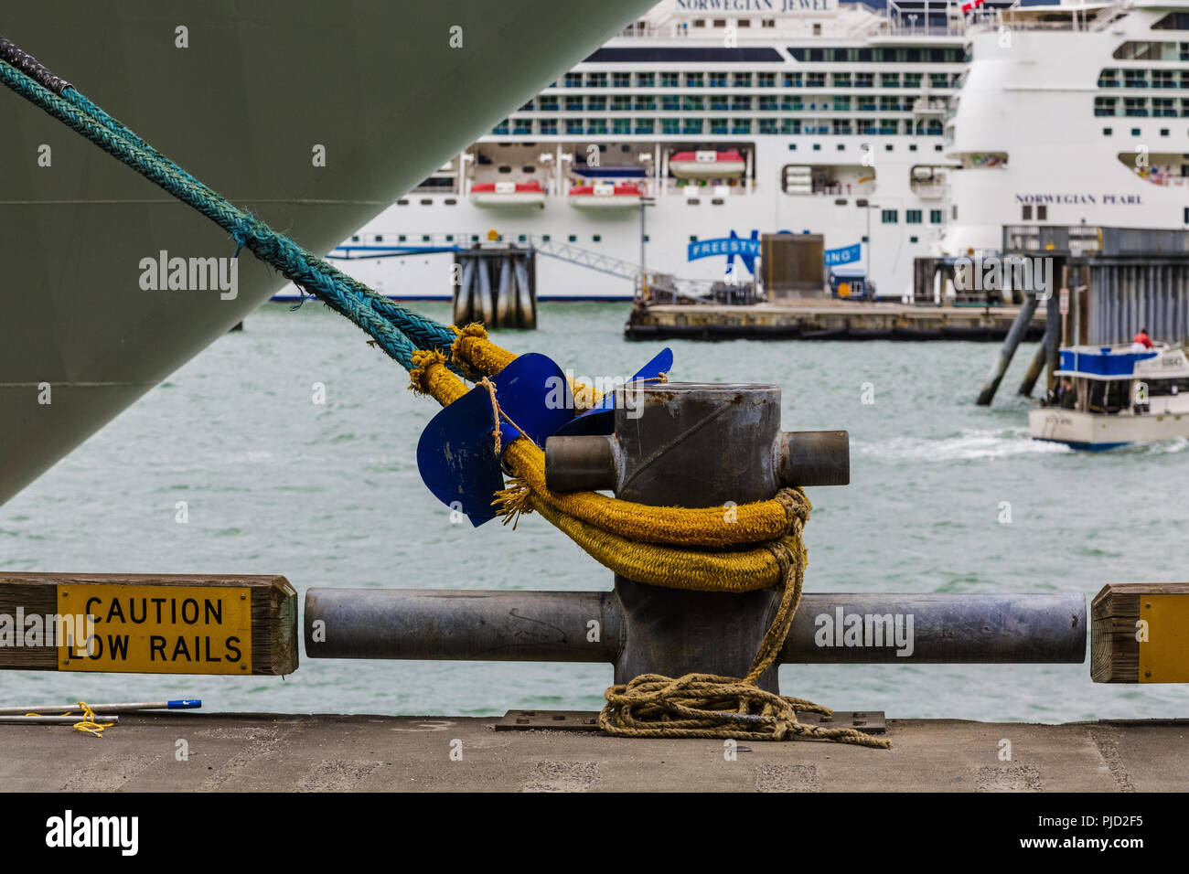 Bollard with Cruise ship in Background Stock Photo - Alamy