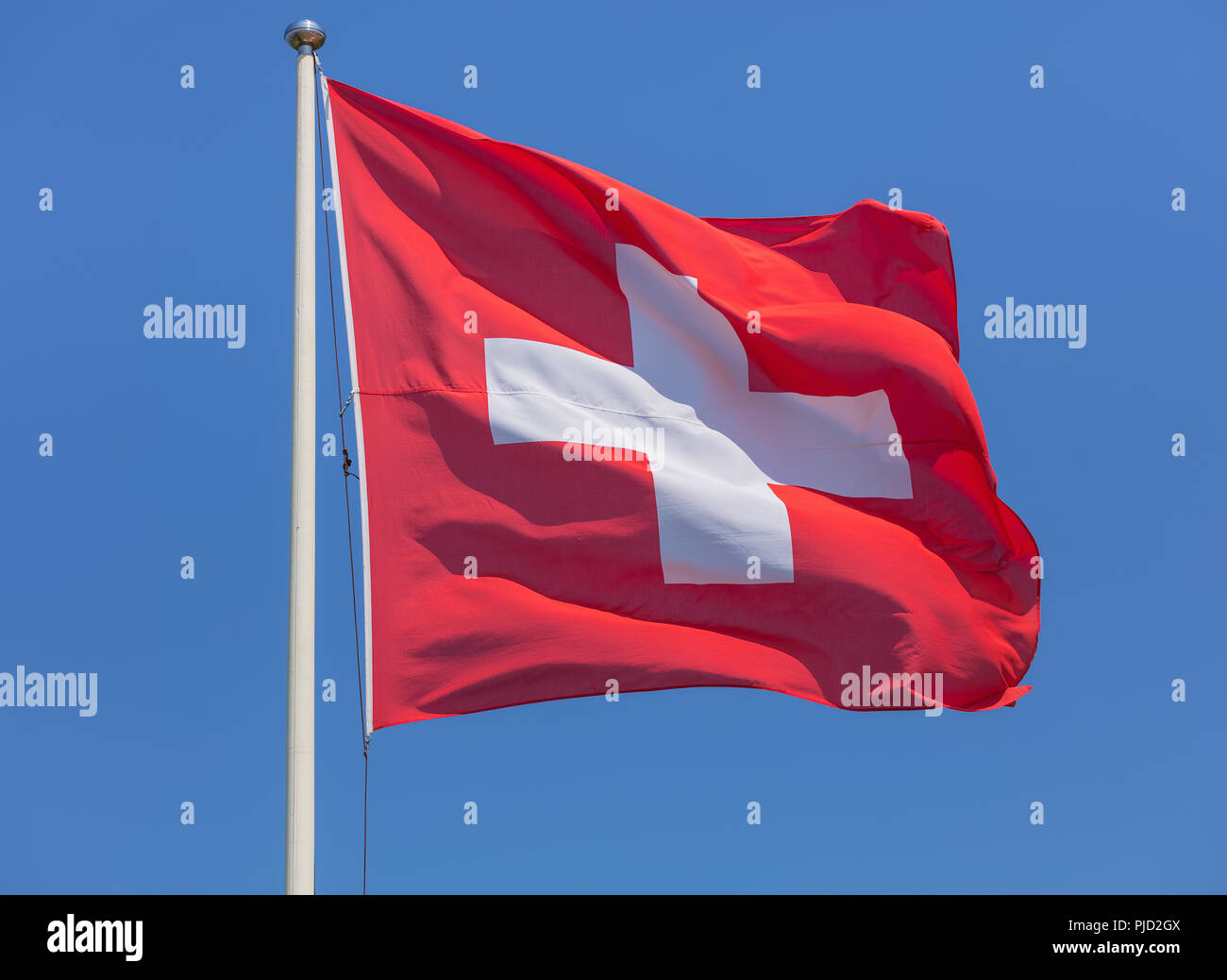 National flag of switzerland waving hi-res stock photography and images ...