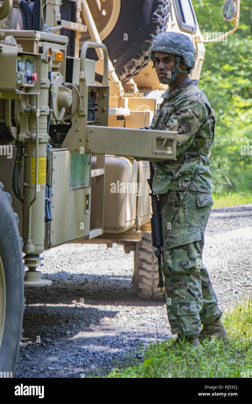 U.S. Army Spc. Johan Alvarez, a wheeled vehicle mechanic with the ...