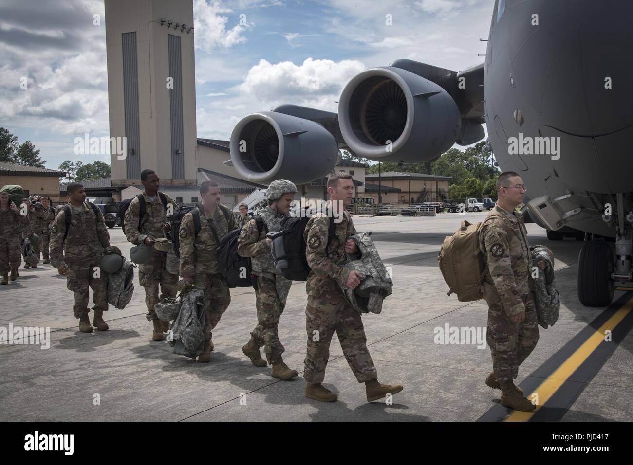 Moody Airmen prepare to board a C-17 Globemaster III prior to deploying ...