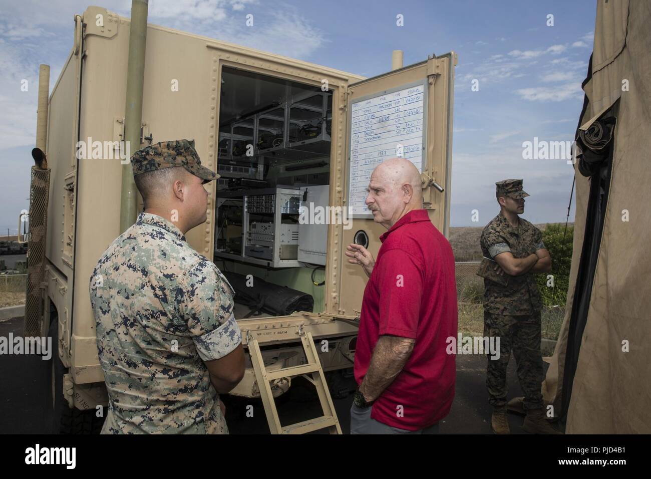 U.S. Marine Corps retired Sgt. John Seebold speaks with U.S. Marine ...