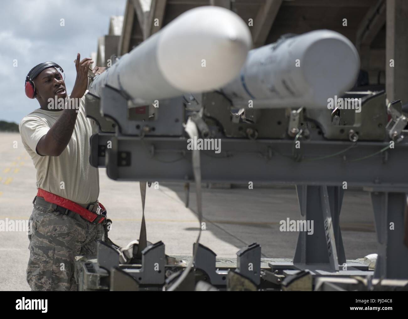 Staff Sgt. James Smith, 67th Aircraft Maintenance Unit weapons load ...