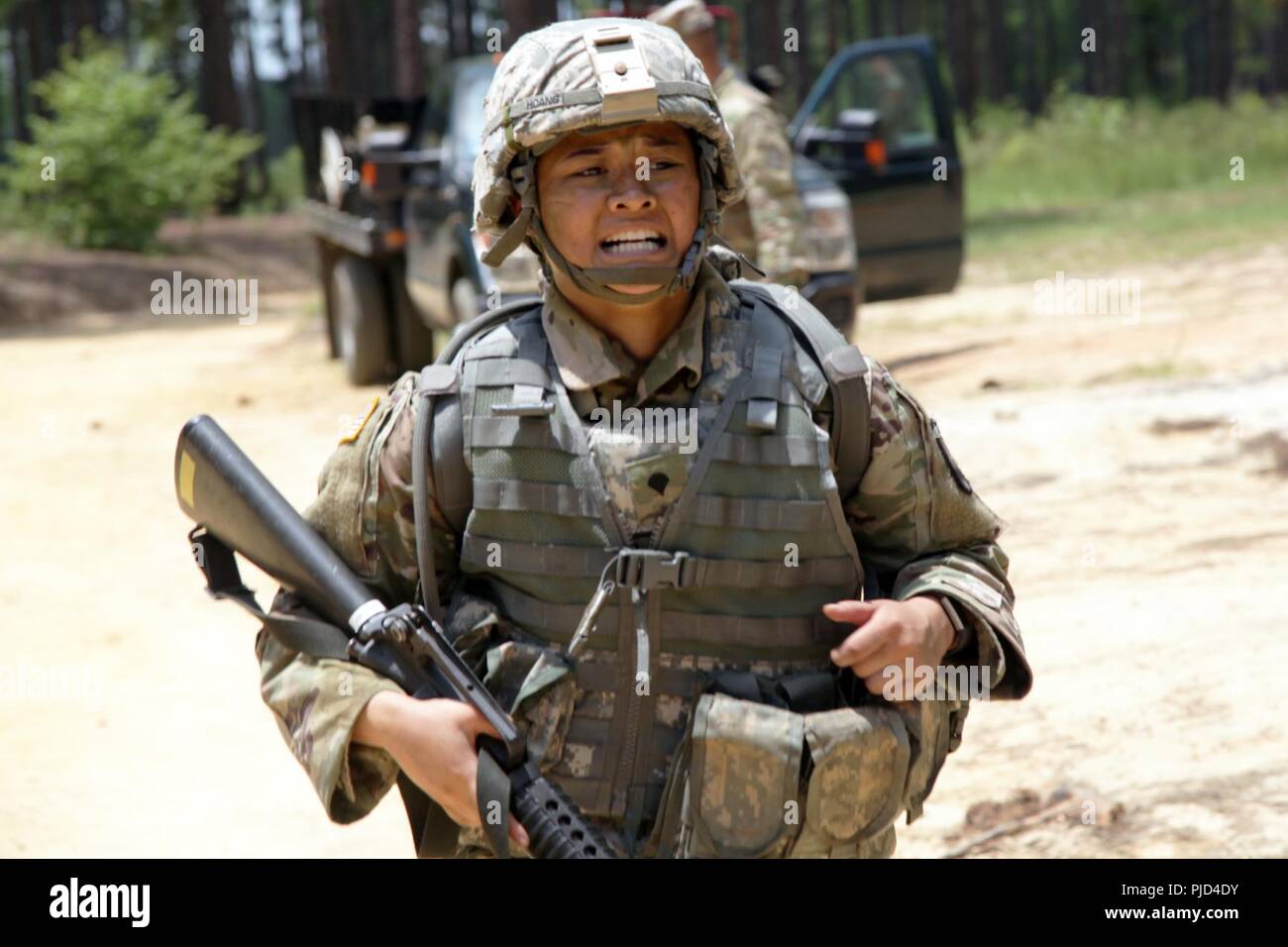 Spc. Diane Hoang from the U.S. Army Training Center, finishes the first ...