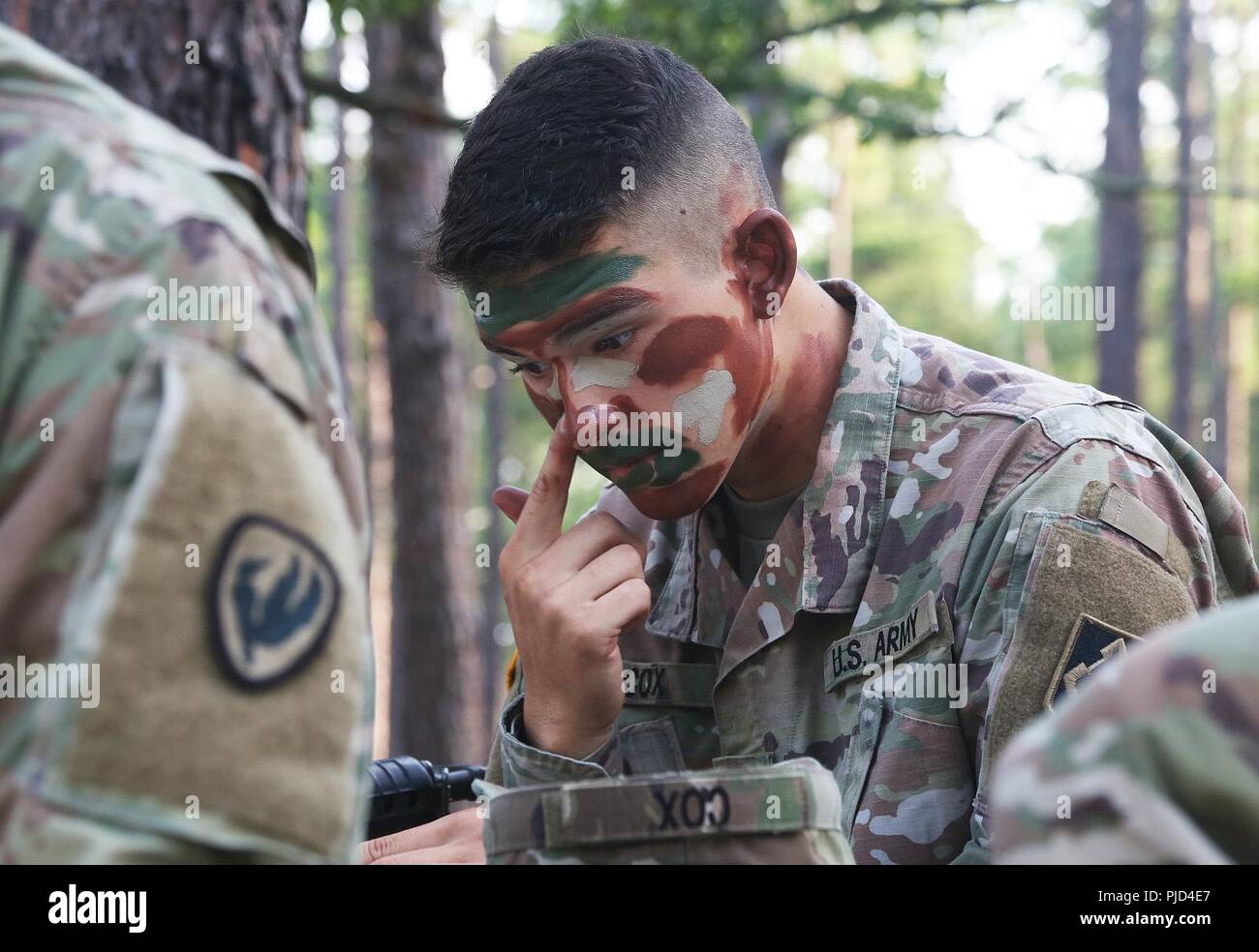 Pfc. David Cox from the Maneuver Support Center of Excellence gets ...