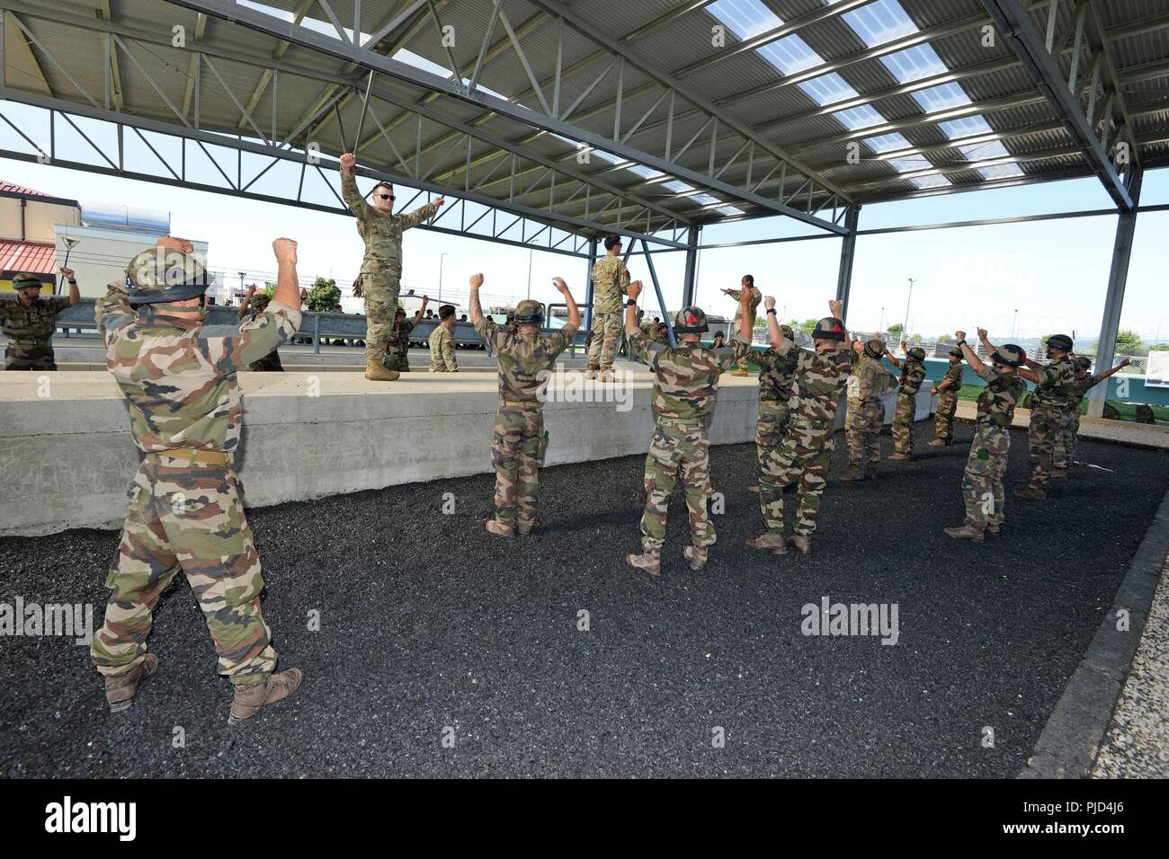 U.S. Army Paratroopers assigned to 173rd Airborne Brigade, explain pre ...