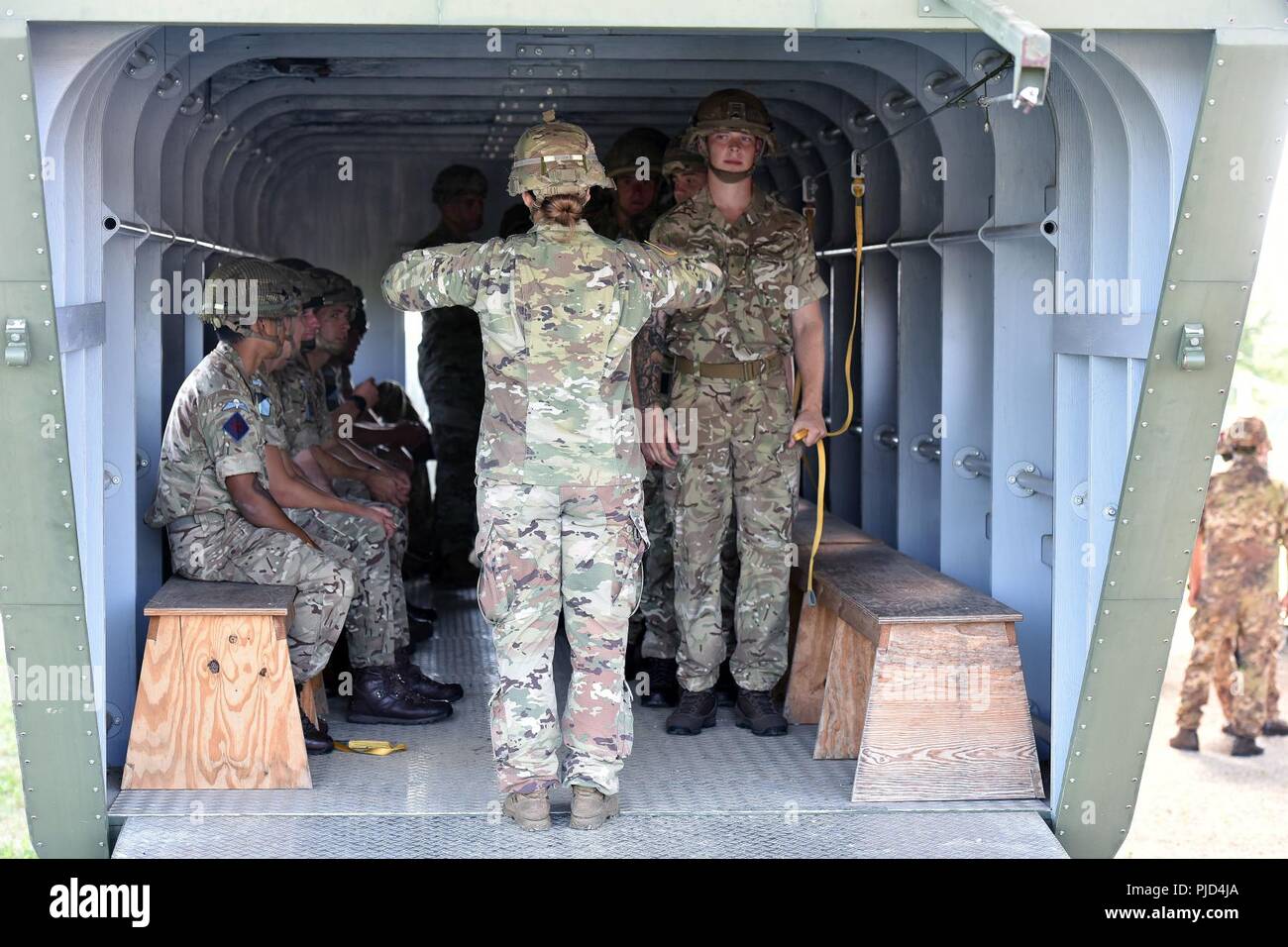 A U.S. Army Paratrooper assigned to 173rd Airborne Brigade, conduct CH ...